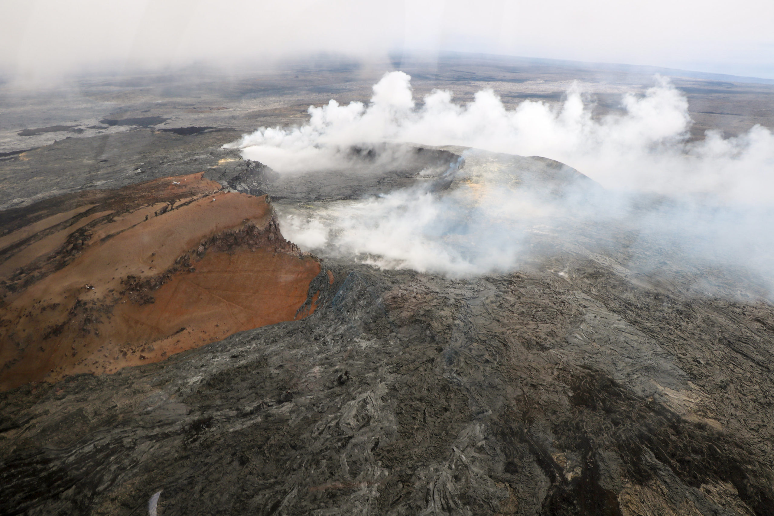 Flying above Volcanoes National Park - Hawaii Travel Guide